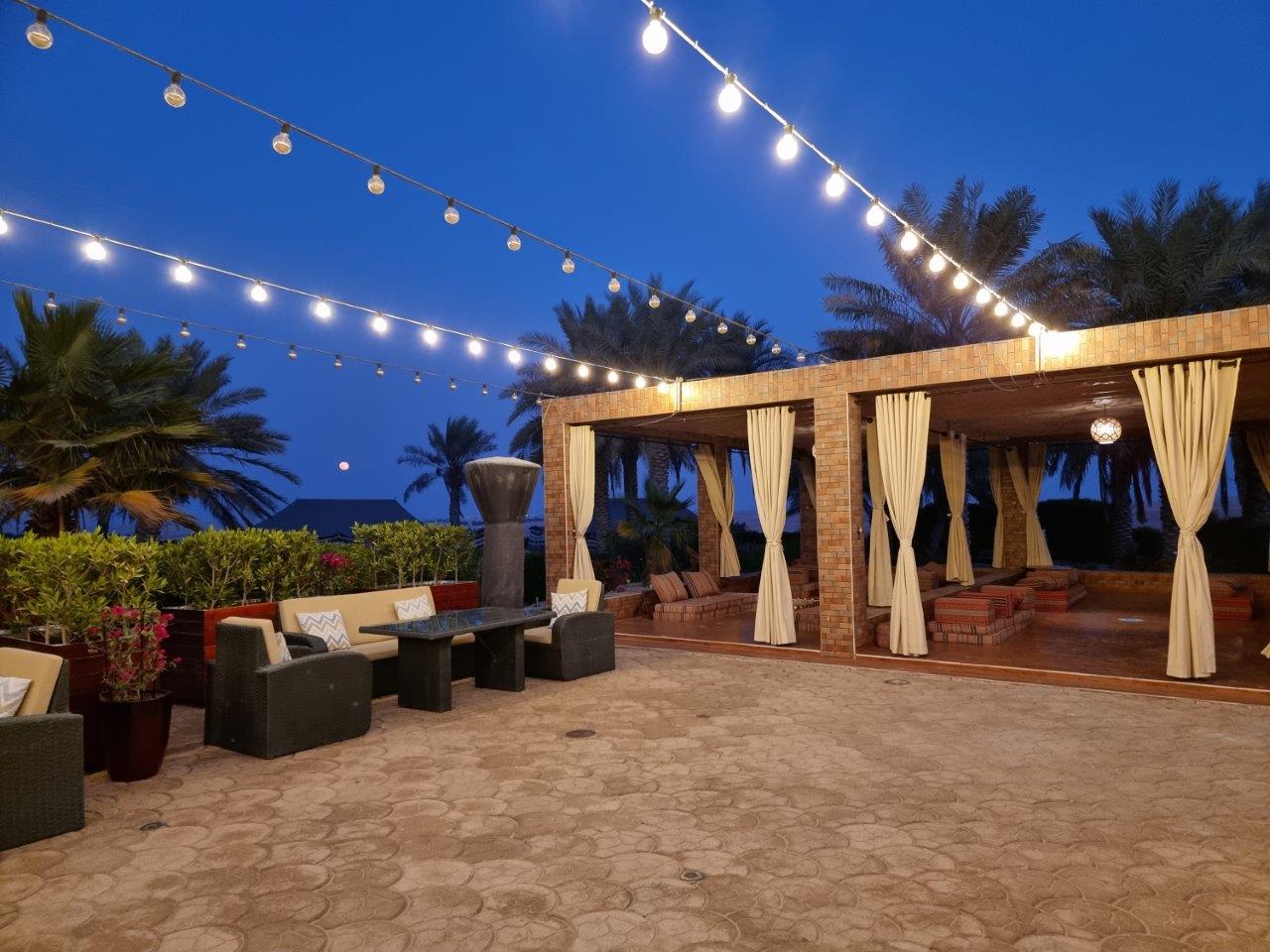 Desert BBQ Dinner at Al Liwan Pool Bar, Tilal Liwa Hotel - Experience ...